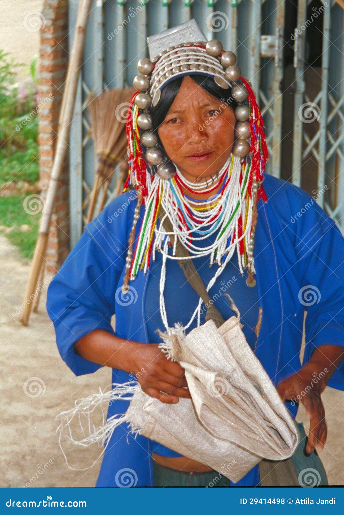 An Akha Family Pose For Tourist Photos At Doi Pui Mong Hill Tribe ...