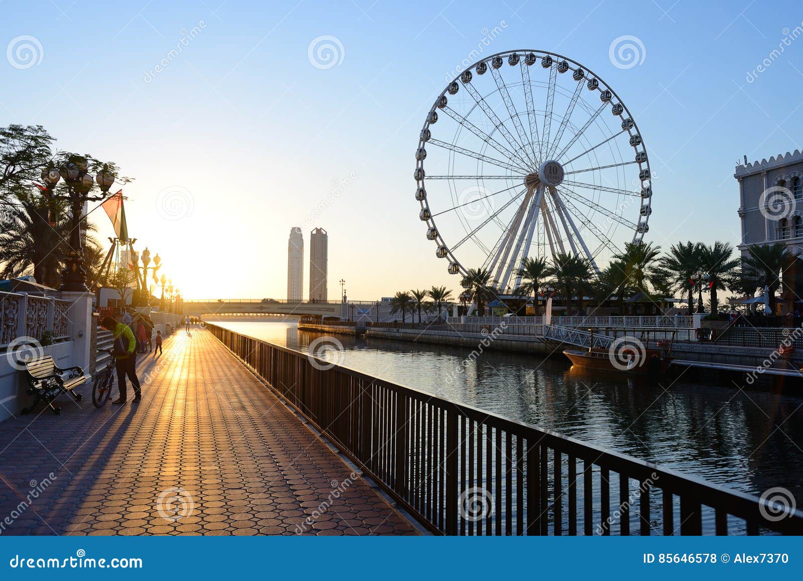 Al Qasba Canal and Eye of the Emirates Wheel in Sharjah Stock Photo ...