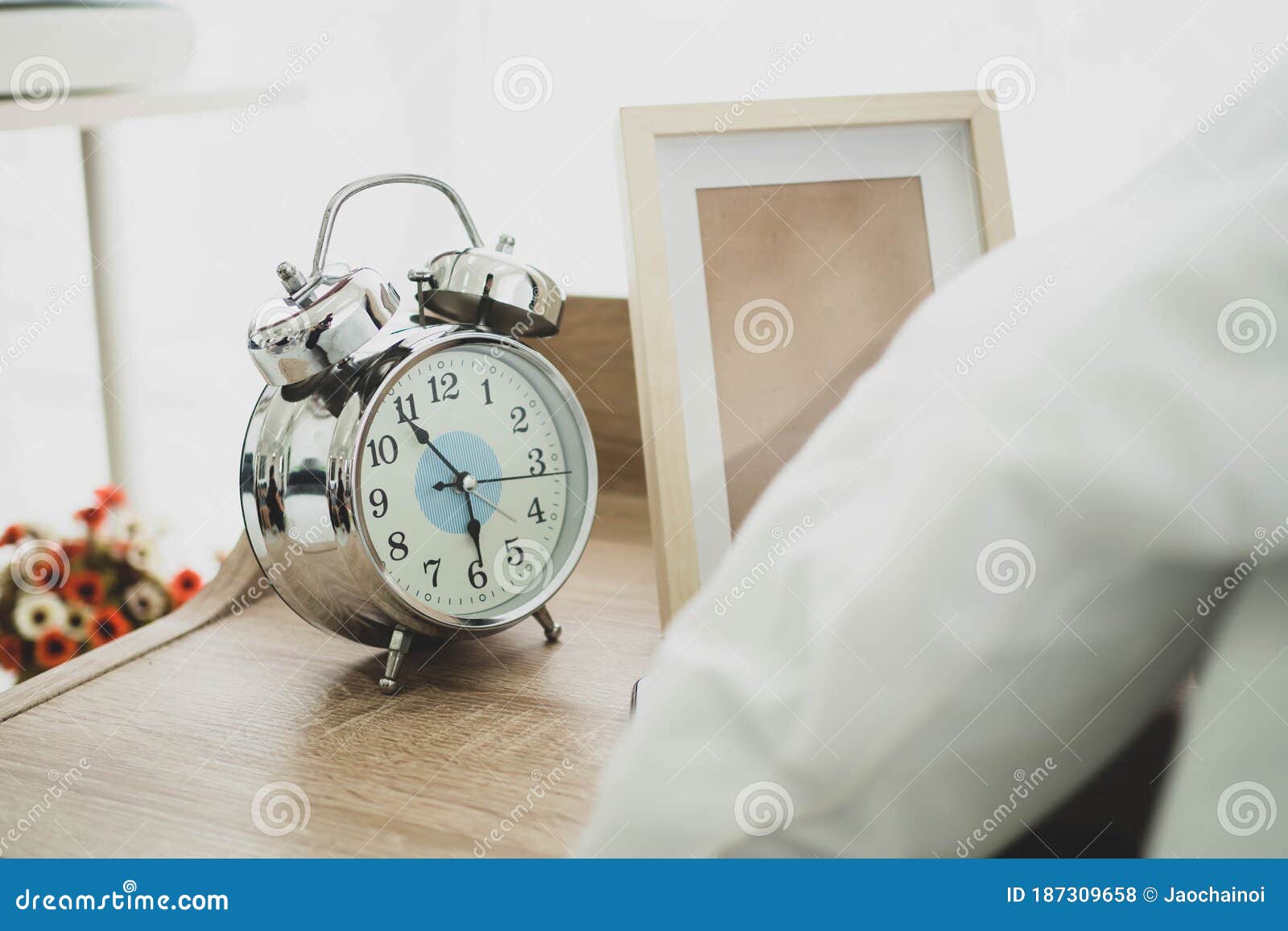 Alarm Clock in the Bed Room Stock Photo - Image of bedside, light ...