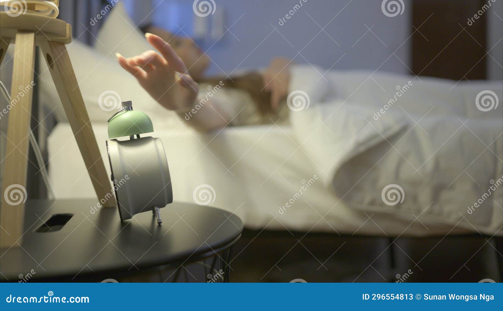 Alarm Clock on a Bedside Table with Woman Sleeping Stock Image - Image ...