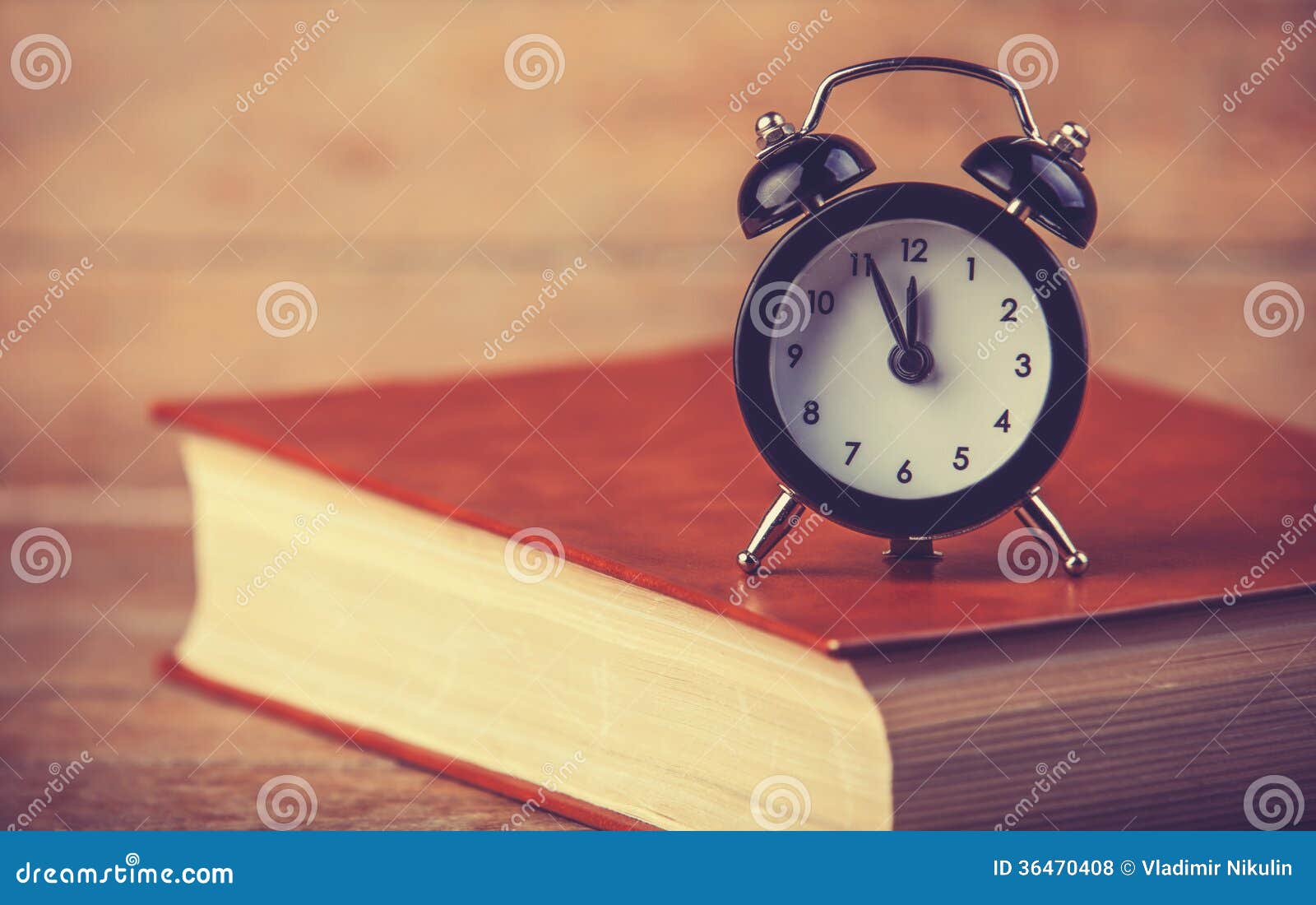 Alarm clock and book. stock photo. Image of education - 36470408