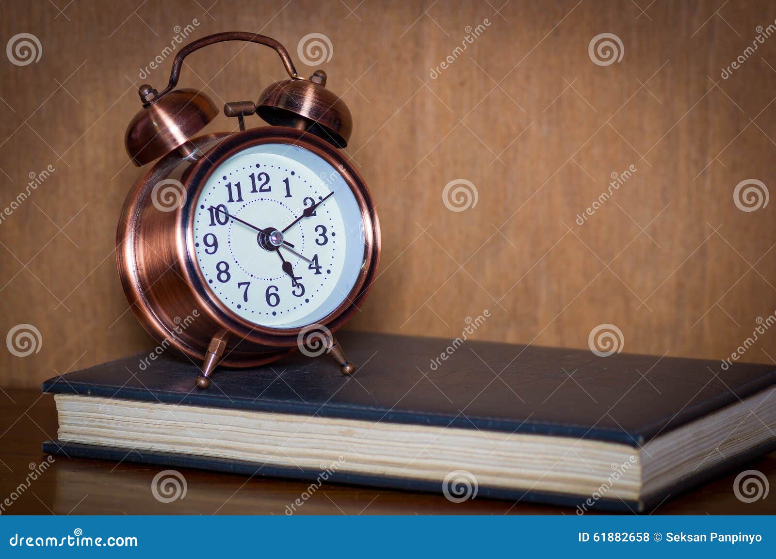Alarm clock and book. stock photo. Image of classic, minute - 61882658