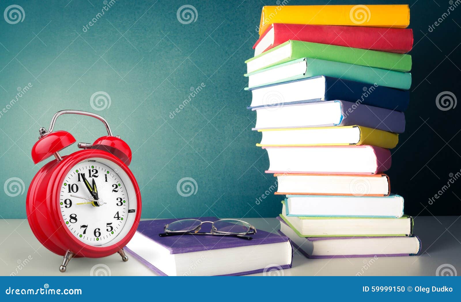 Alarm clock and books stock photo. Image of white, number - 59999150