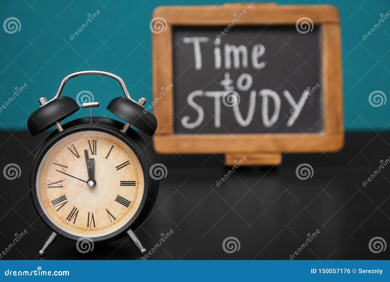 Alarm Clock and Chalkboard with Phrase "Time To Study " on Table ...