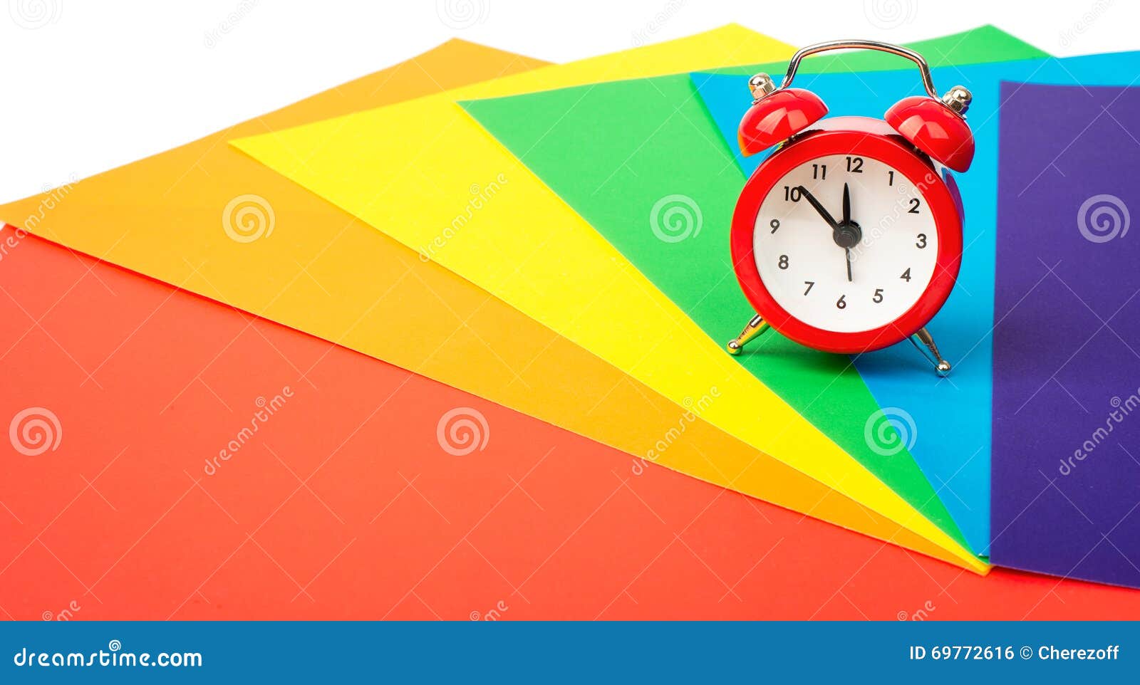 Alarm Clock with Colorful Paper Stock Photo - Image of blue, white ...