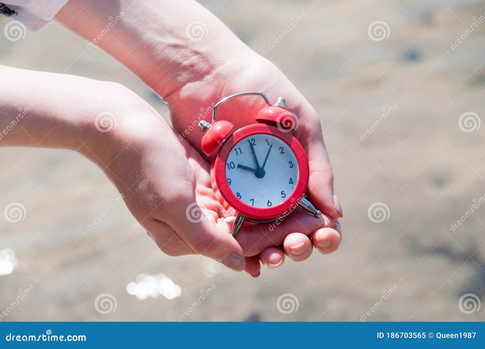 Alarm Clock in Female Hands. Symbol of Fast Passing Time Stock Image ...