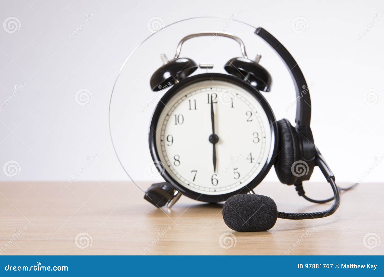 Alarm Clock with Headset on Desk Stock Image - Image of wearing, caller ...