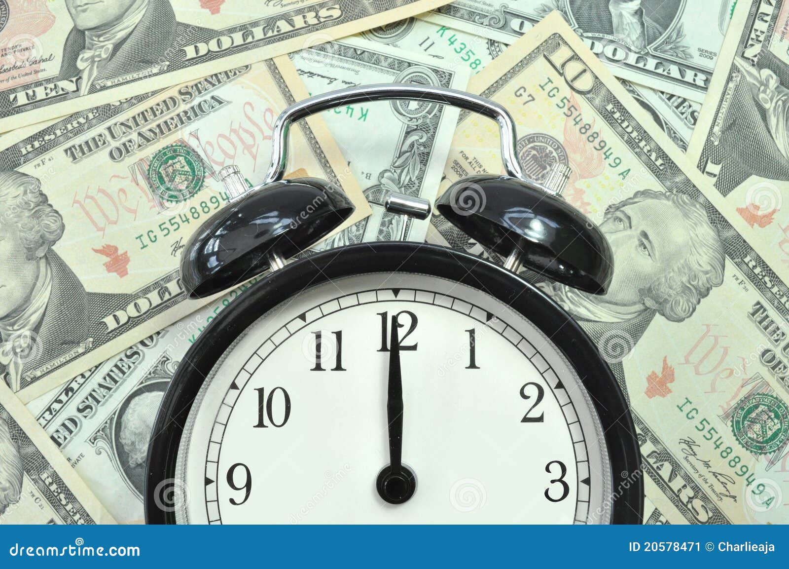 Alarm clock and money stock image. Image of banknotes - 20578471