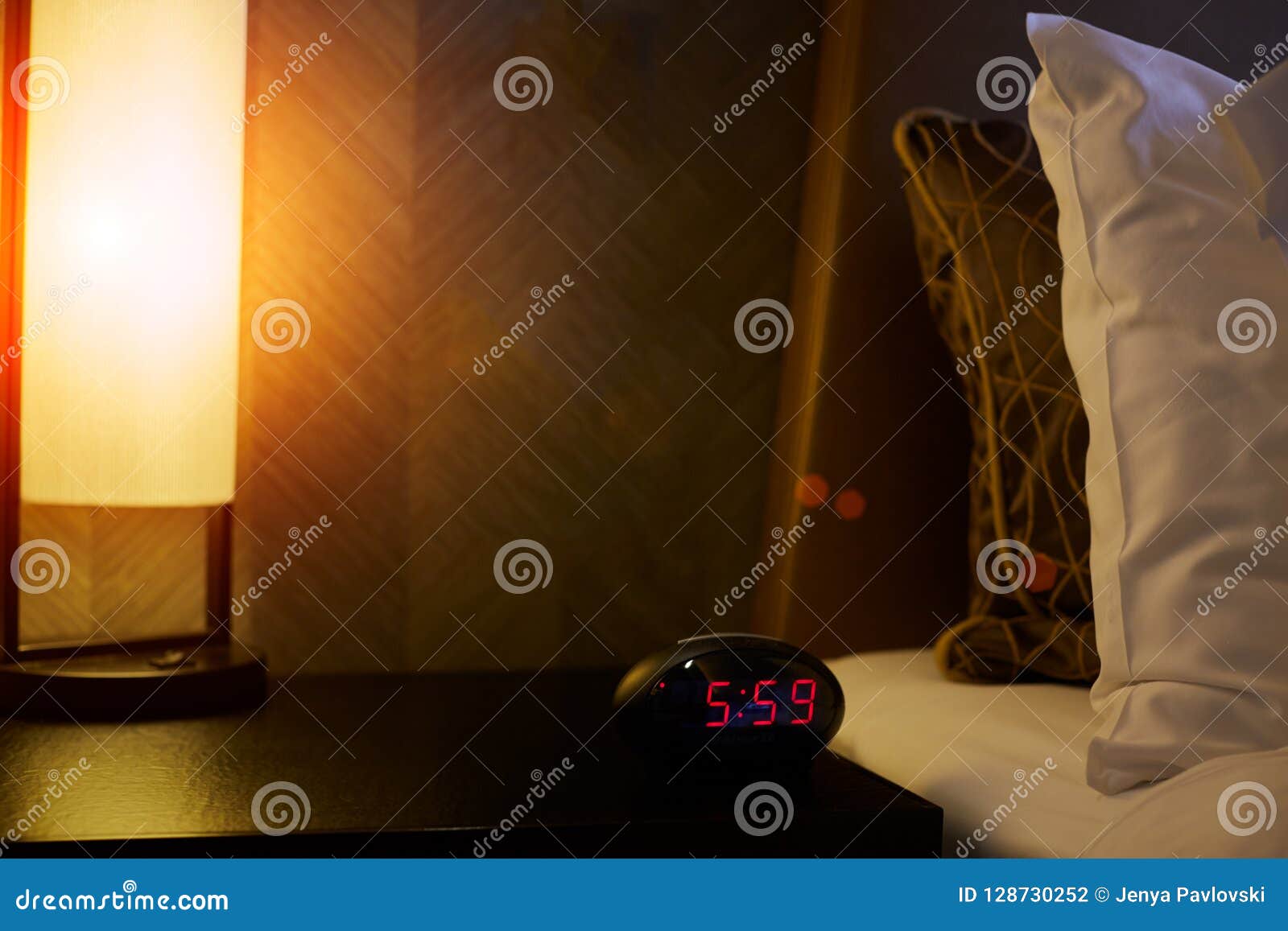 Alarm Clock Near the Bed in Bedroom Stock Photo - Image of business ...