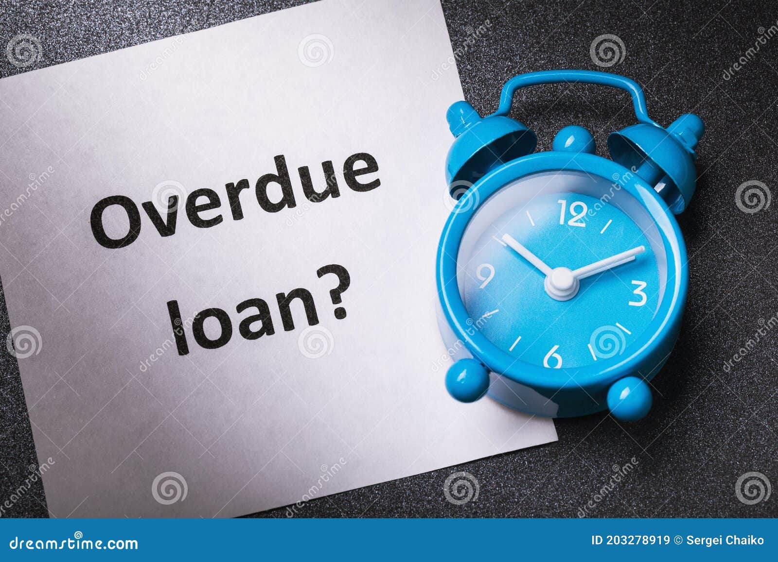 Alarm Clock and Note with Text on the Table. Overdue Loan Concept Stock ...