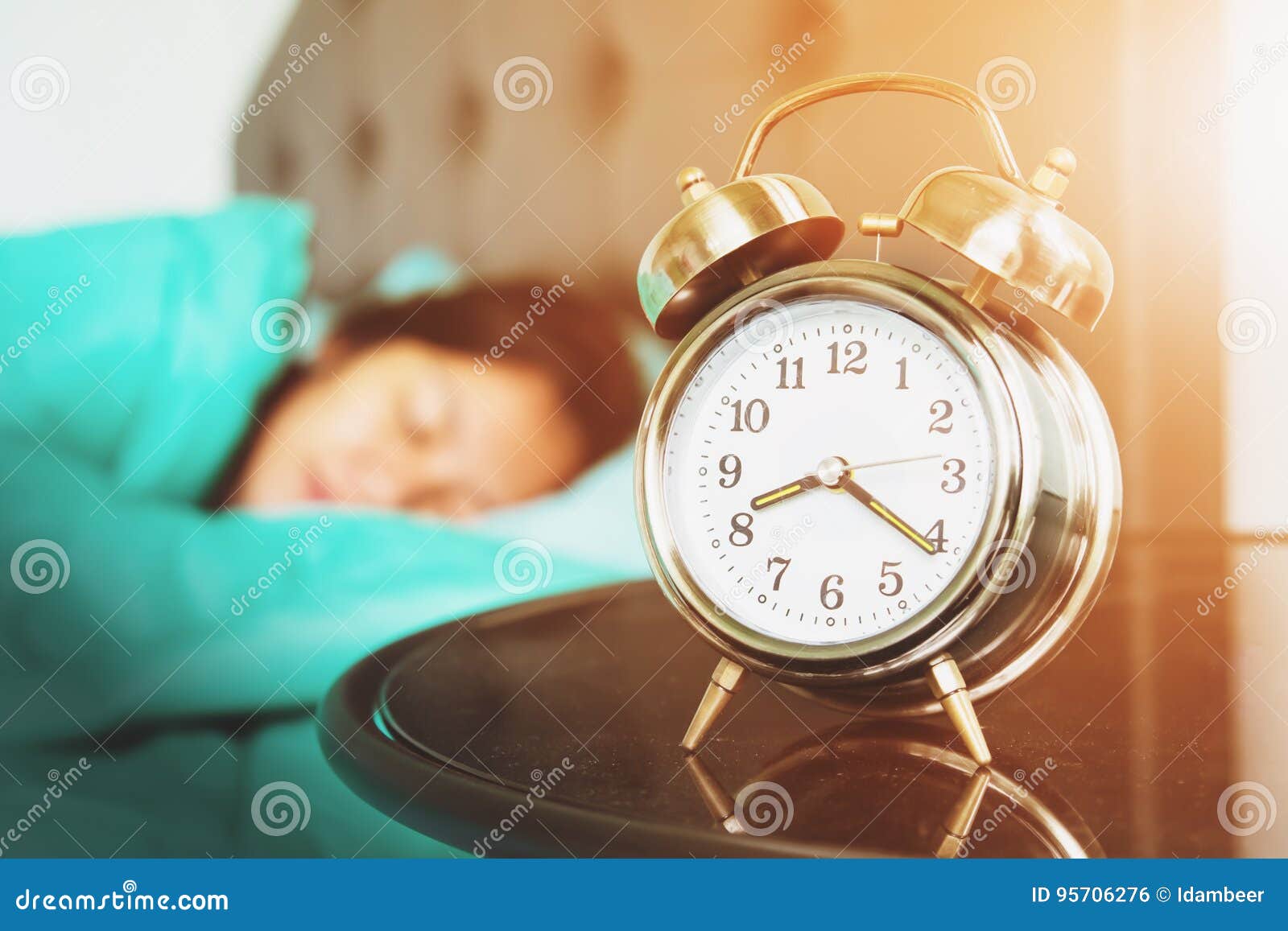 Sleeping Boy Hitting The Alarm Clock At The Early Morning. Creative ...