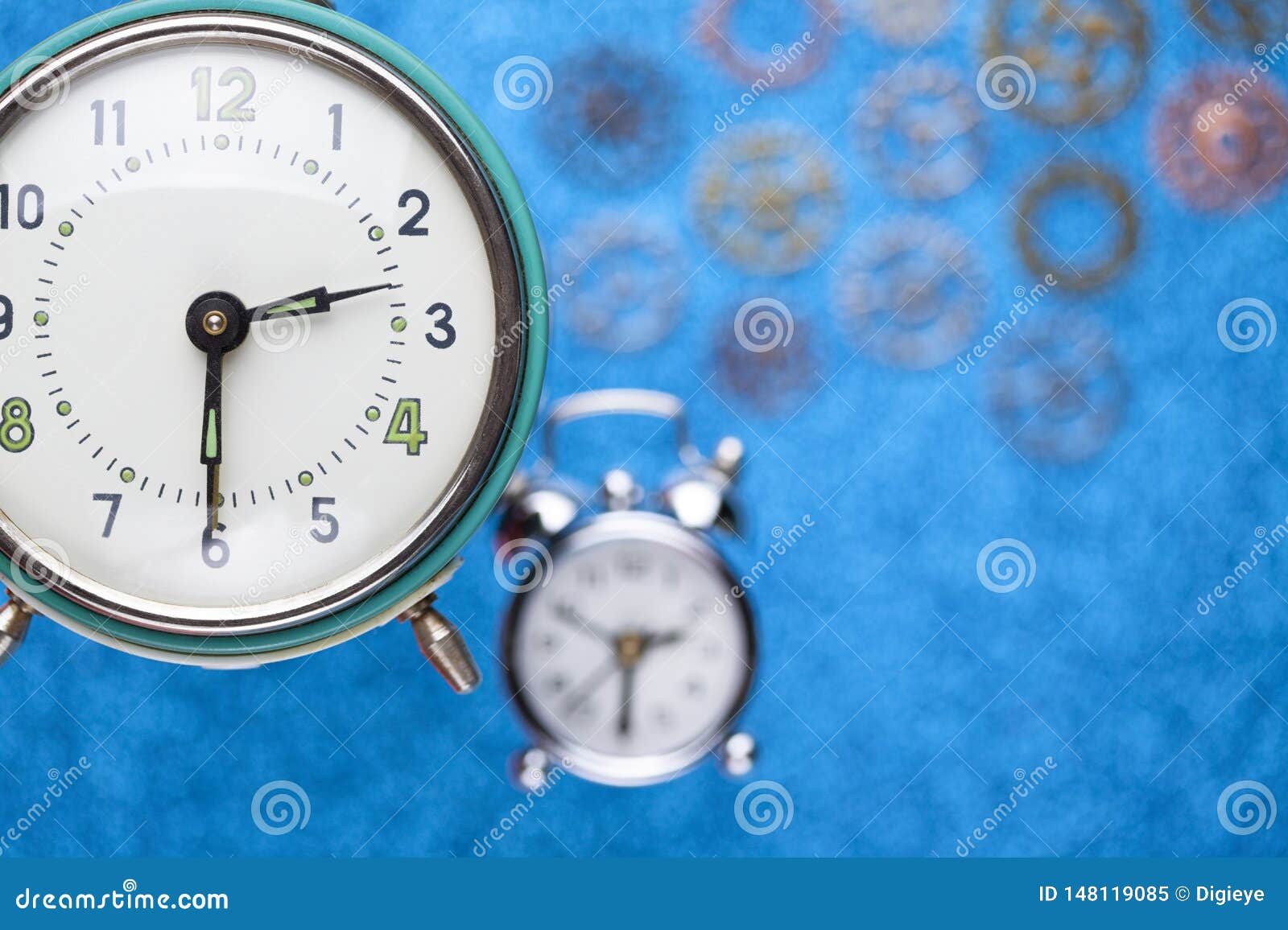 Alarm Clock and Parts of Watch on Blue Background Stock Image - Image ...