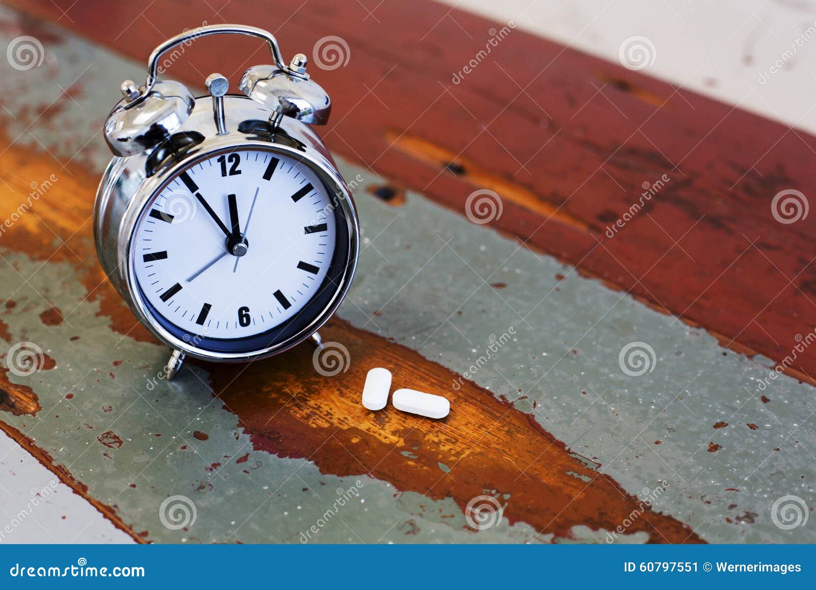 Alarm clock with pills stock image. Image of background - 60797551