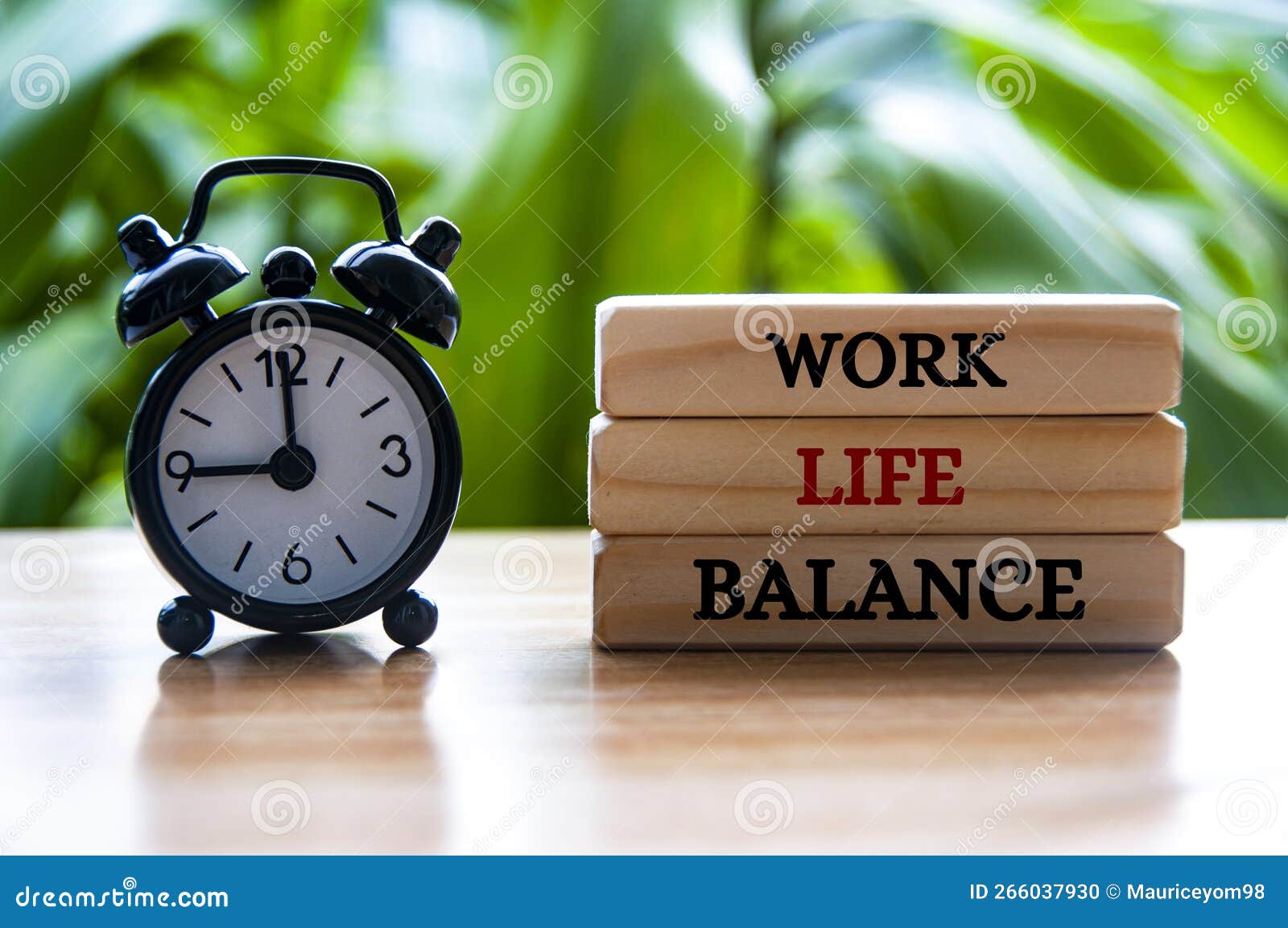 Alarm Clock Pointing at 9am with Work Life Balance Text on Wooden ... Alarm Clock Pointing at 9am with Work Life Balance Text on Wooden ...