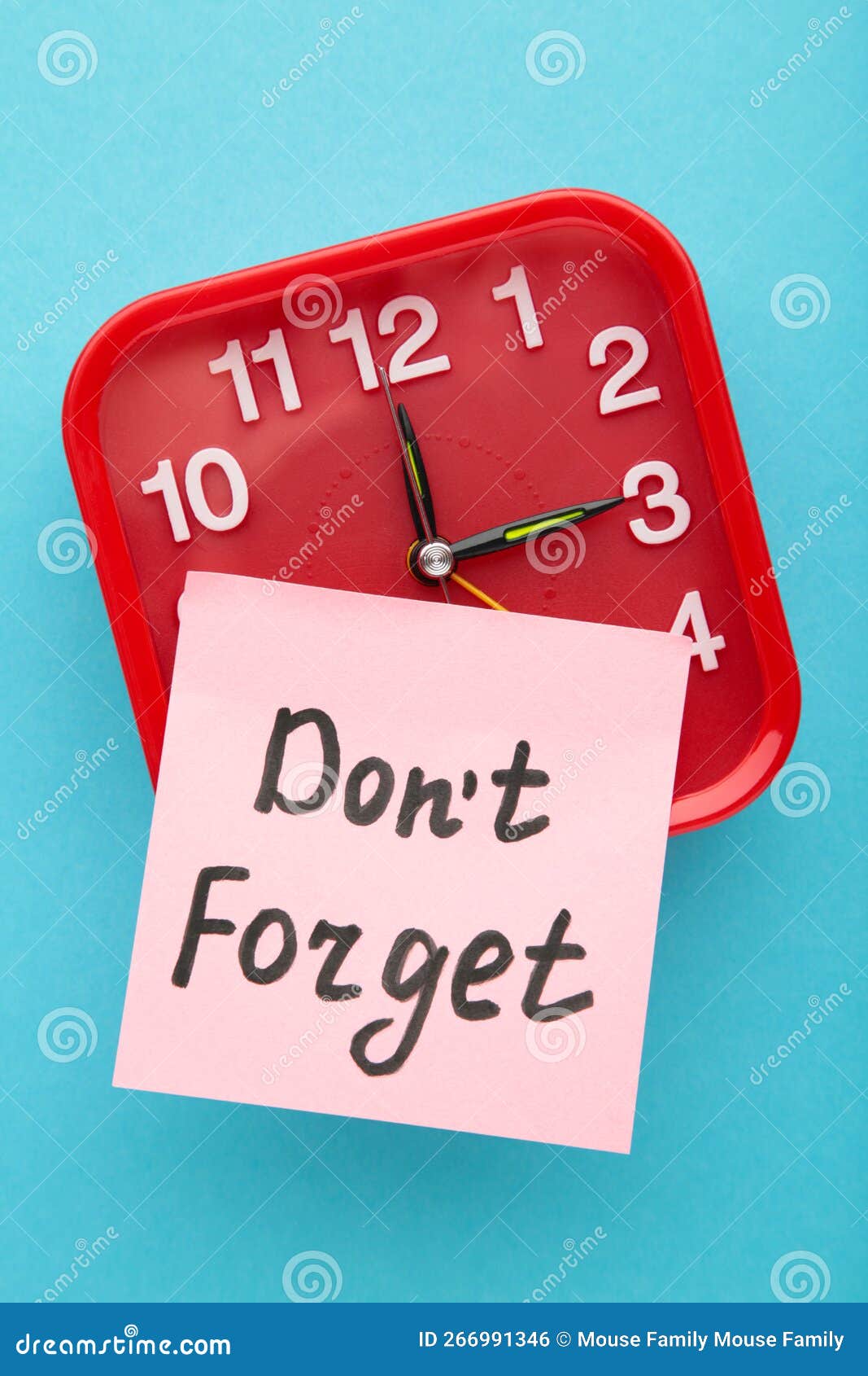 Alarm Clock and Reminder Note with Phrase Don`t Forget on Light Blue ...