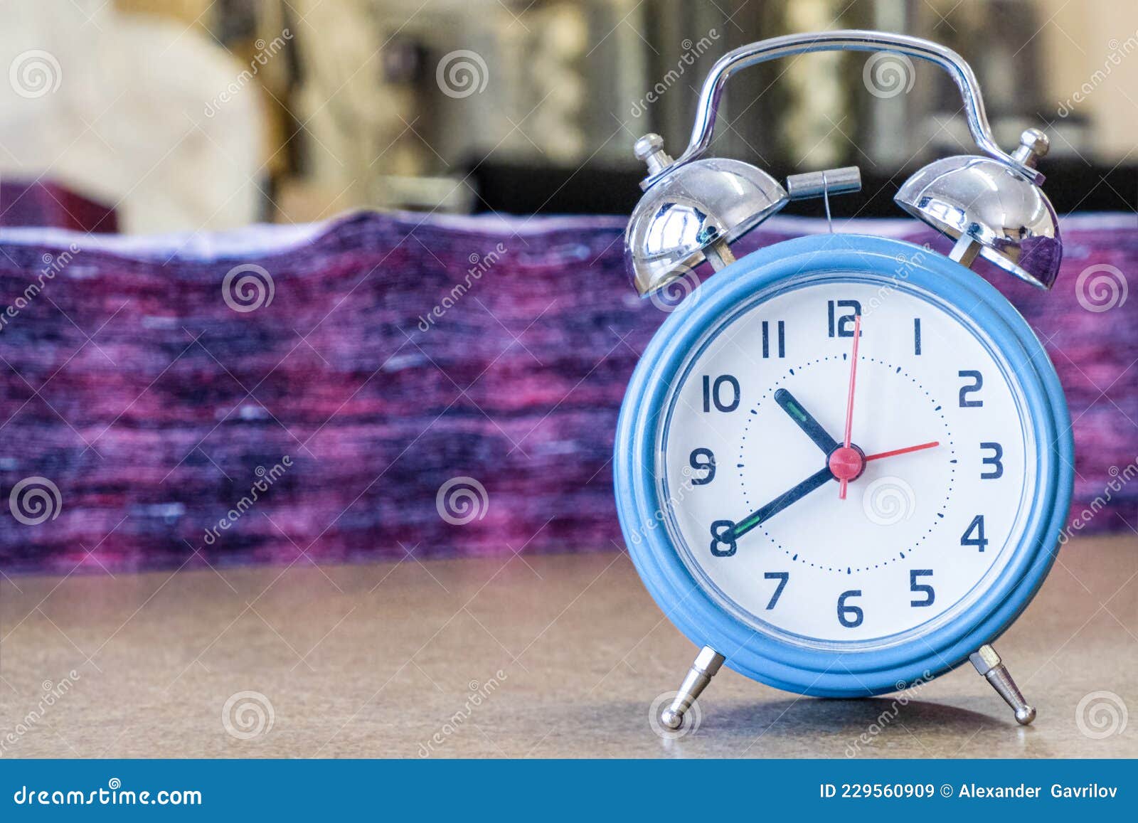 The Alarm Clock Shows the Time at the Workplace. Working Hours Stock ...