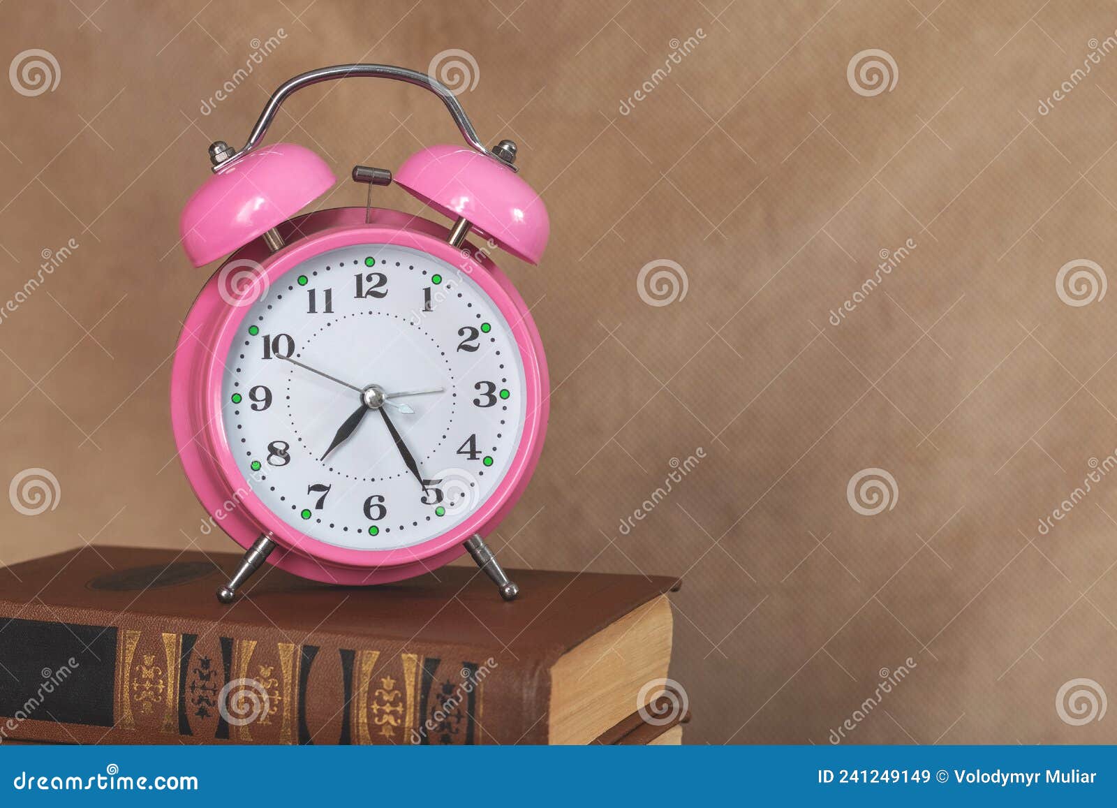 Alarm Clock on a Stack of Books. Clock in the Library Stock Image ...