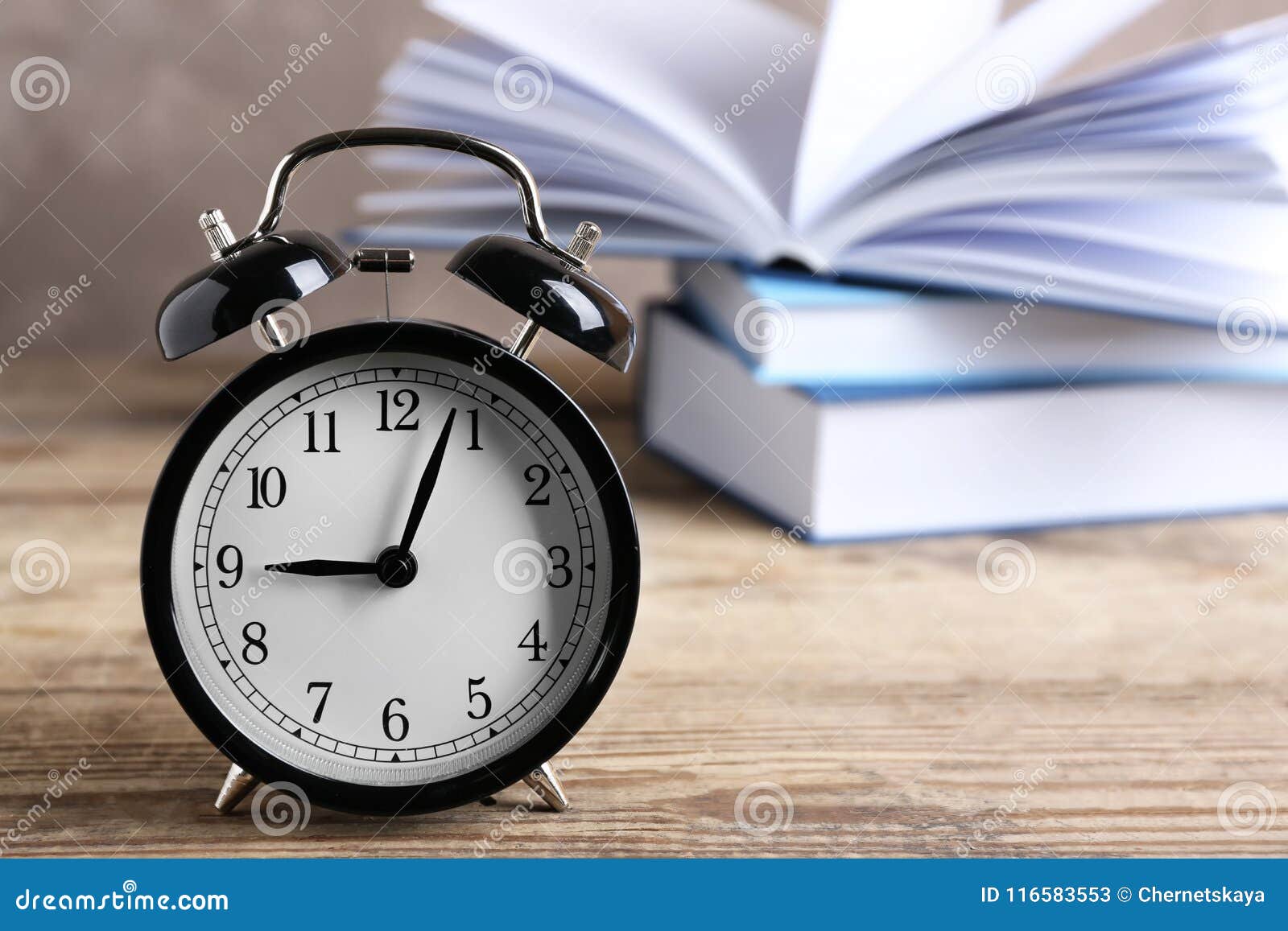 Alarm Clock and Stack of Books on Table Stock Image - Image of closeup ... Alarm Clock and Stack of Books on Table Stock Image - Image of closeup ...