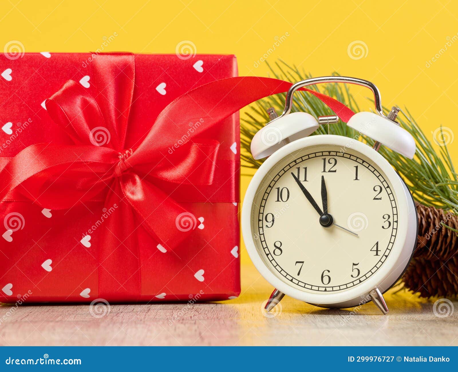 Alarm Clock and Stack of Red Gift Boxes on Yellow Background Stock ...