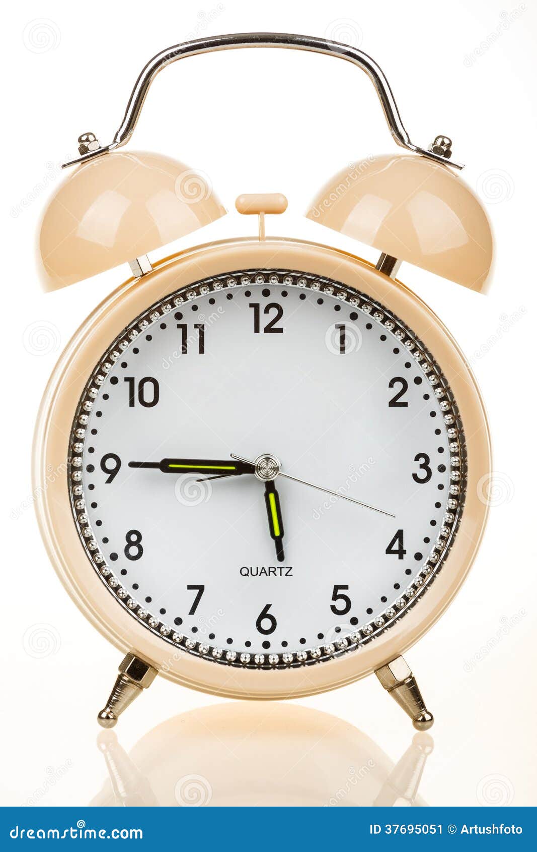 Alarm clock on a table stock image. Image of clock, alarmclock - 37695051