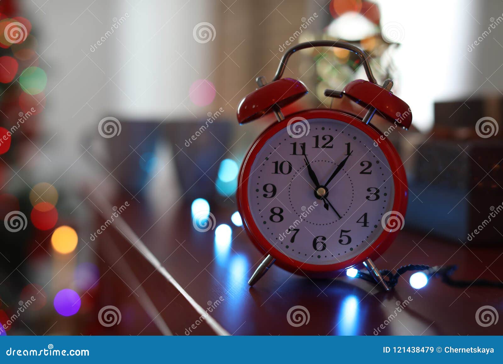 Alarm Clock on Table in Stylish Interior Stock Image - Image of garland ...
