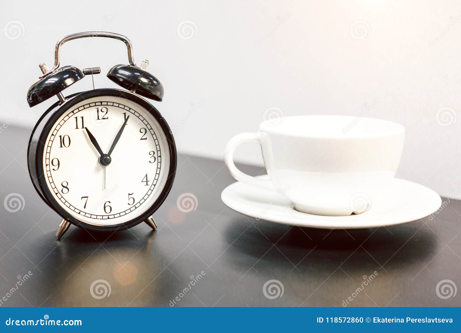 Alarm Clock on the Table and White Mug, Tea Time, Rest Concept Stock ...
