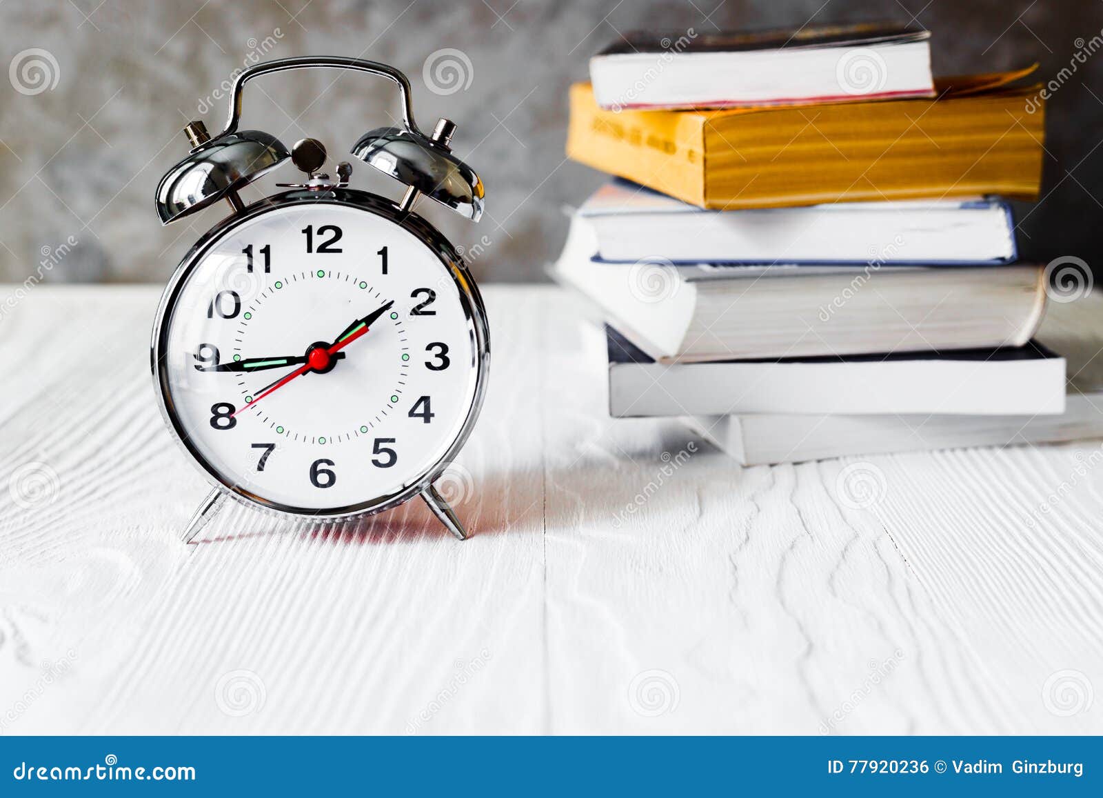 Alarm Clock Time To Read Books Stock Photo - Image of time, table: 77920236