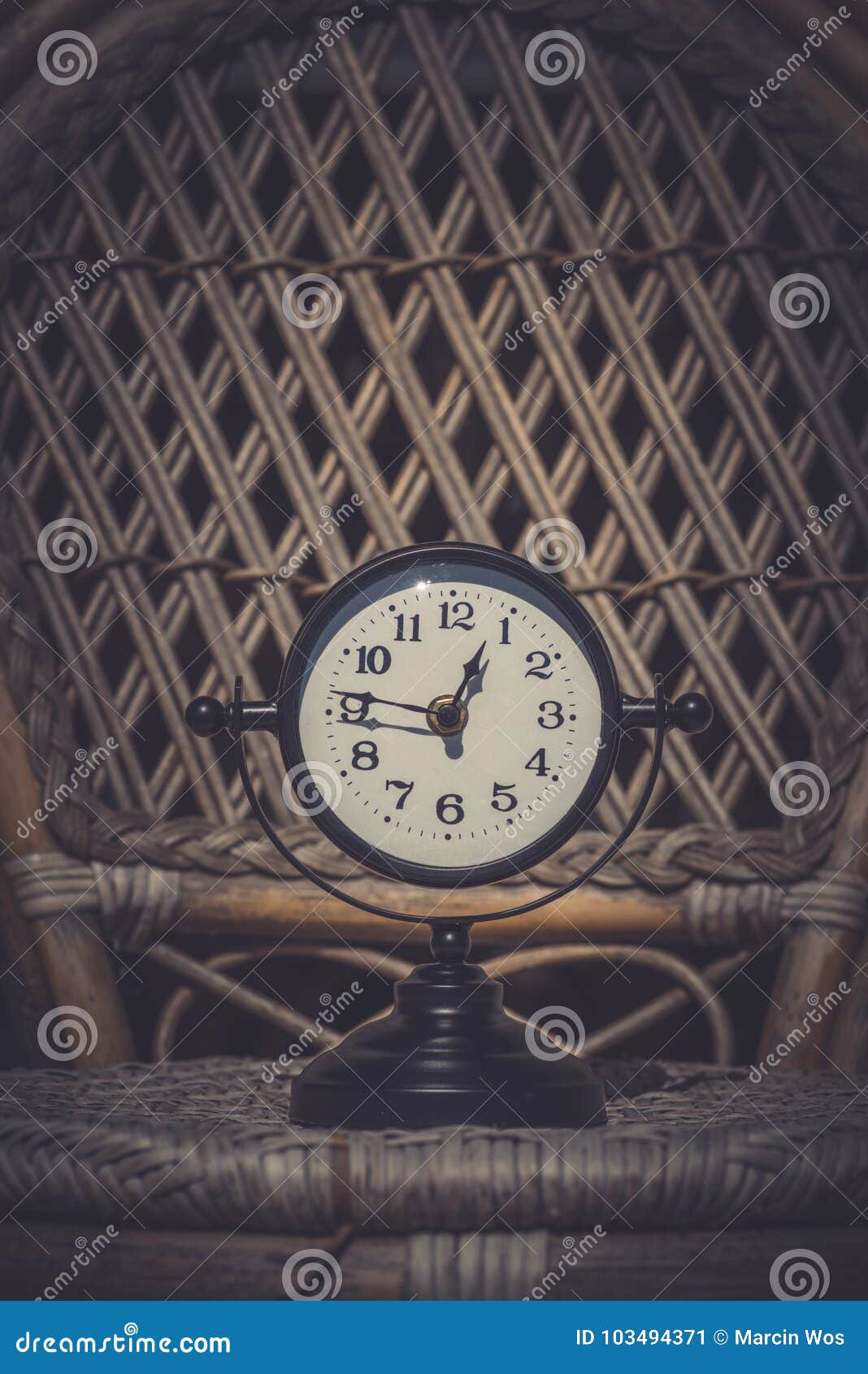 Alarm Clock on Wicker Chair. Stock Image - Image of alarmclock ...