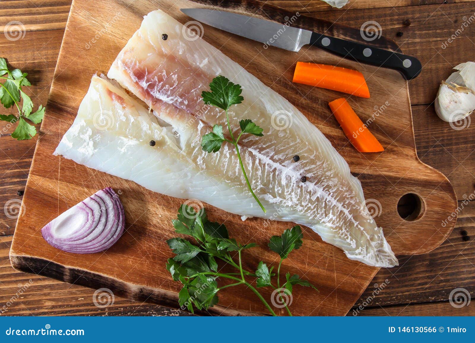 Alaskan Cod Fillet on Cutting Board with Other Ingredient Stock Photo ...