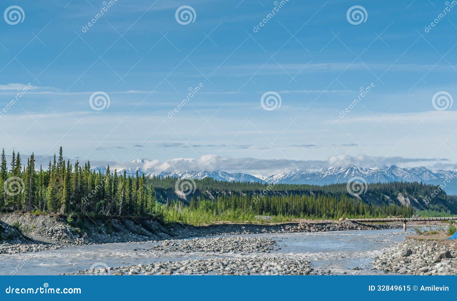 An Alaskan River Runs Through A Gravel Flat Royalty-Free Stock ...