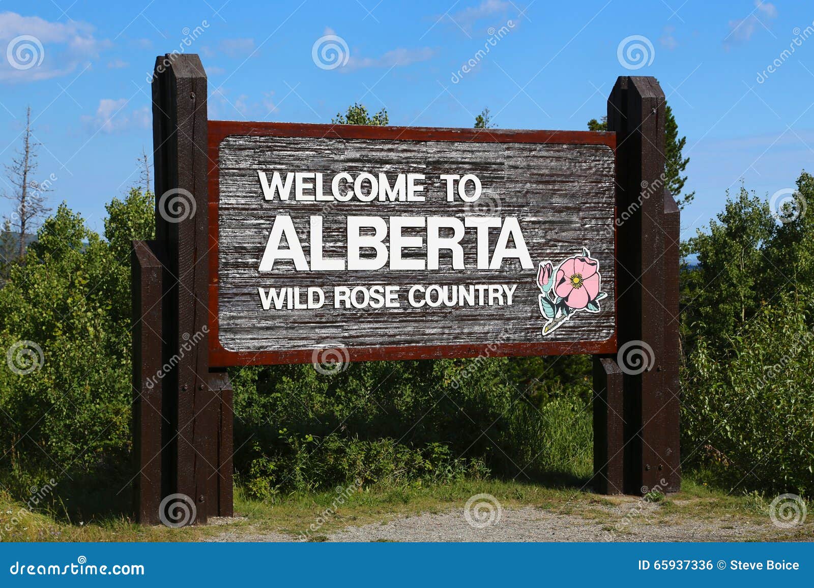 Alberta Canada Welcome Sign Stock Foto - Image of berg, bloem: 65937336