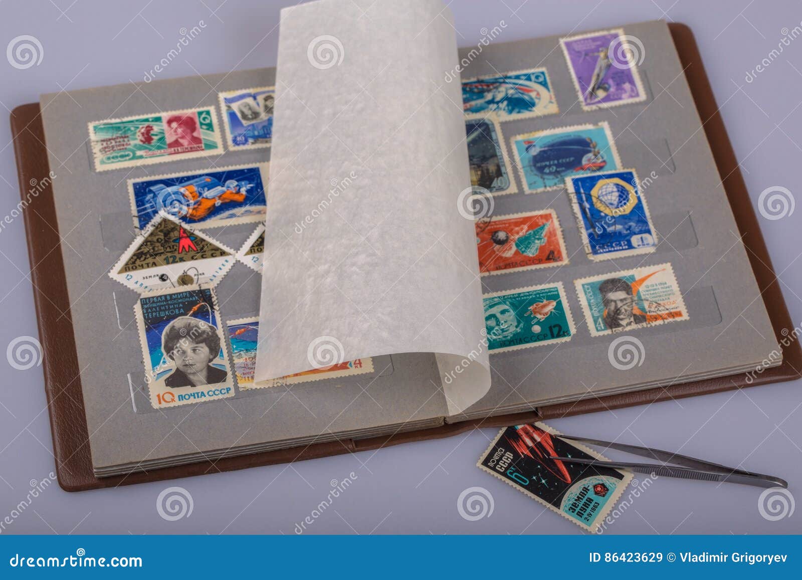 An album of postage stamps editorial stock image. Image of album - 86423629
