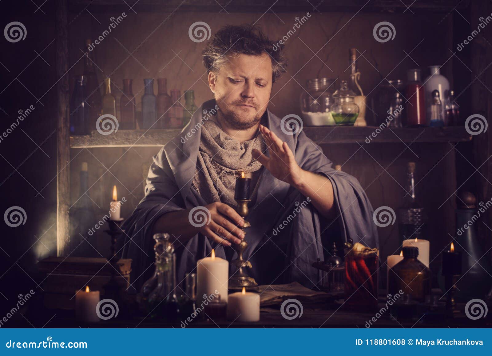 Alchemist at the table stock photo. Image of chemistry - 118801608