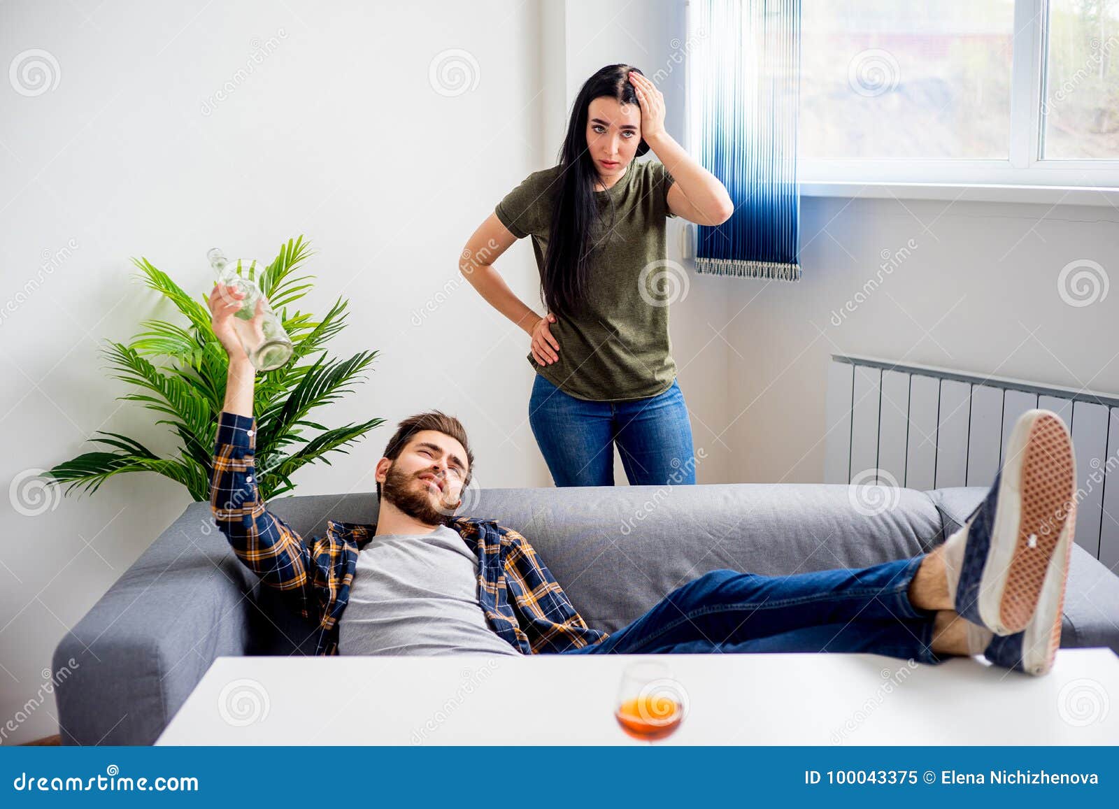 Alcohol addicted husband stock image. Image of despondency - 100043375