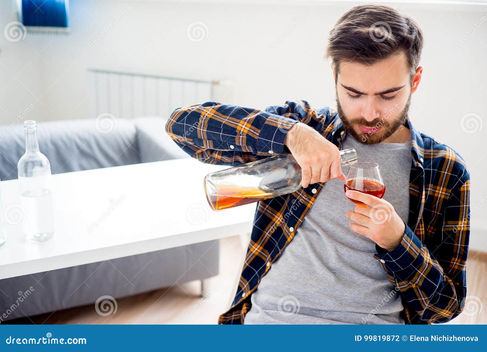 Alcohol addicted man stock photo. Image of holding, rehab - 99819872