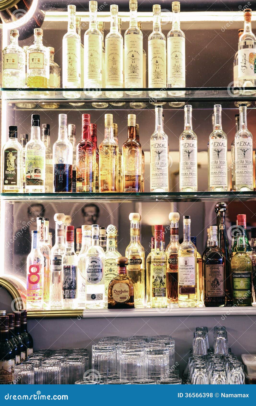 Alcohol bottles in a bar editorial stock photo. Image of vintage - 36566398