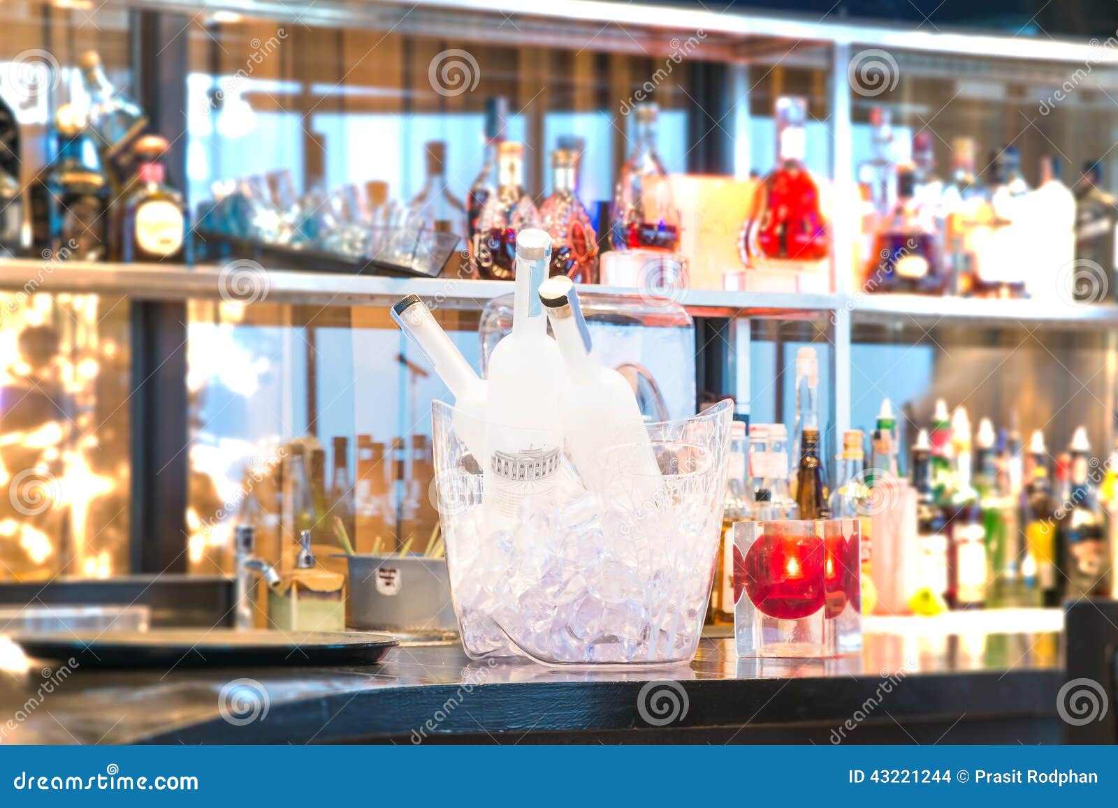 Alcohol Bottles in a Bucket of Ice Stock Photo - Image of condensation ...
