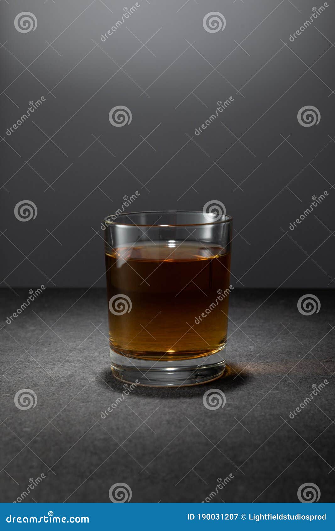 Alcohol Drink in Glass on Grey Stock Image - Image of beverage, alcohol ...