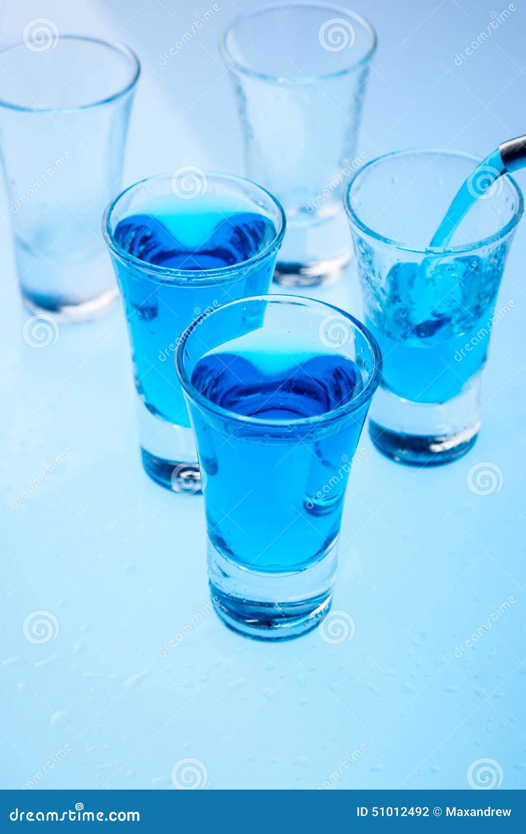 Alcohol in shot glasses stock photo. Image of closeup - 51012492