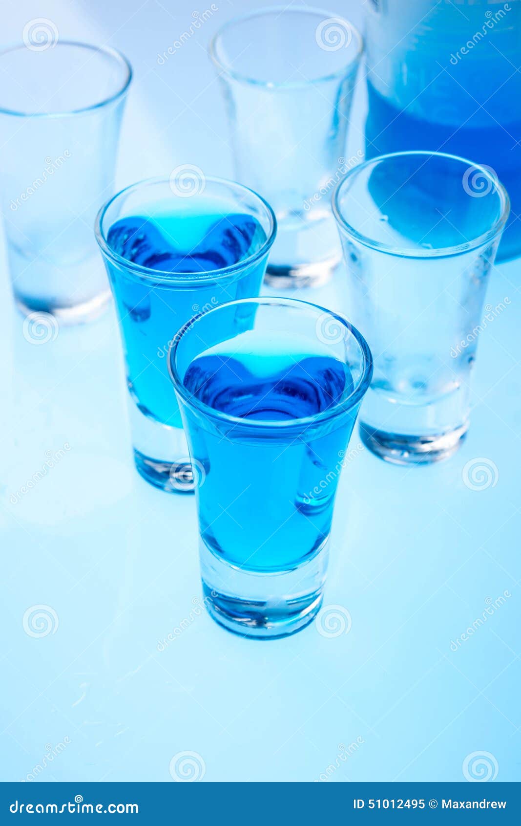 Alcohol in shot glasses stock image. Image of blue, shot - 51012495