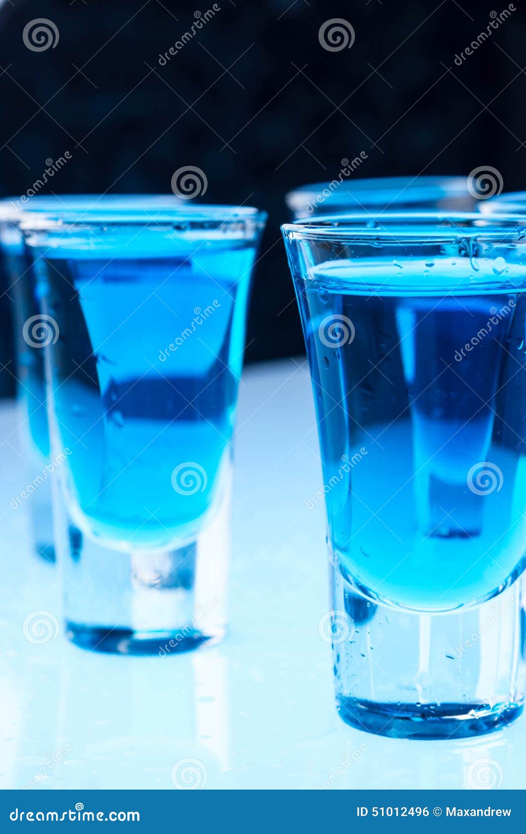 Alcohol in shot glasses stock photo. Image of strong - 51012496