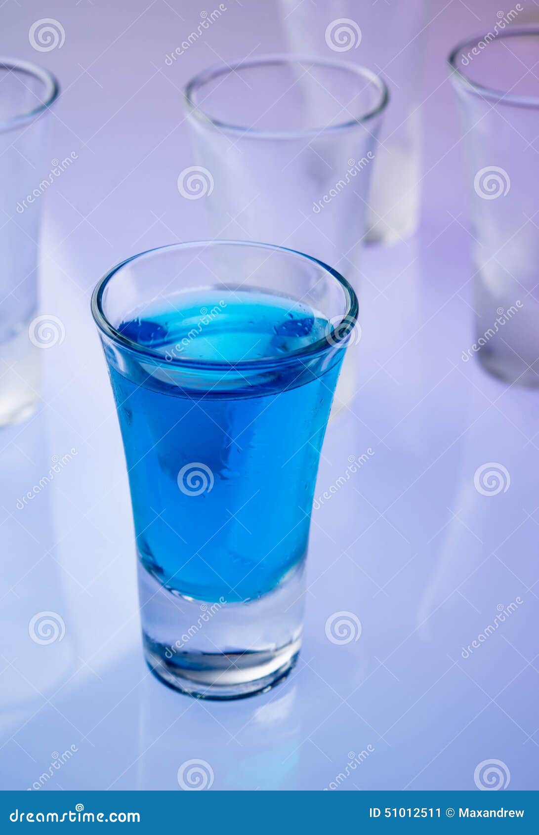 Alcohol in shot glasses stock image. Image of vodka, nightclub - 51012511