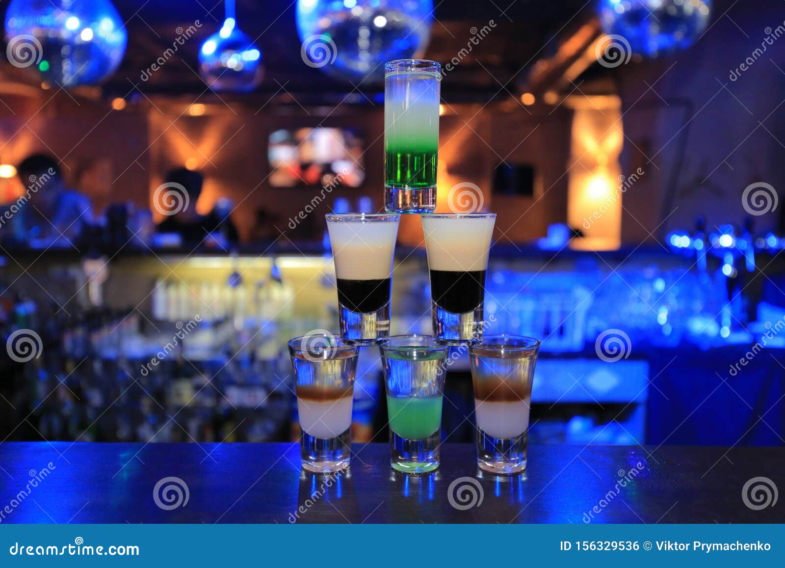 Alcohol shots at the bar stock photo. Image of liquid - 156329536