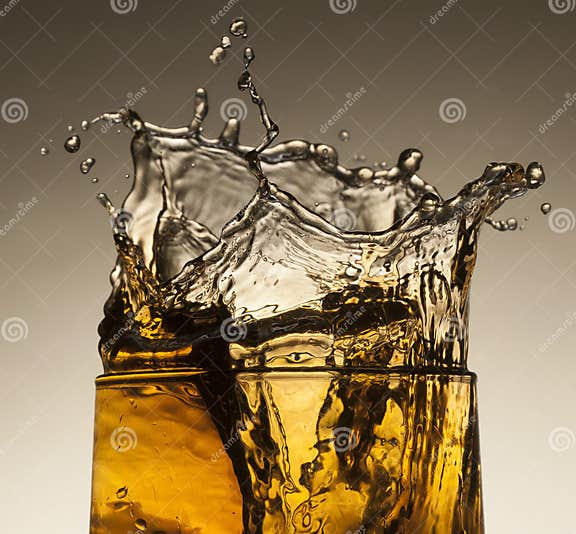 Alcohol Splash stock photo. Image of grab, whiskey, hand - 48297820