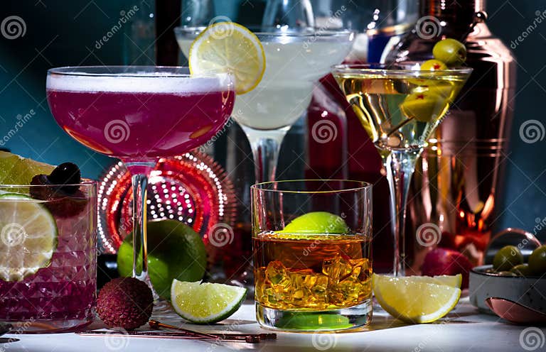 Alcoholic Cocktails Set Strong Drinks And Aperitifs Bar Tools Bottles On Dark Green