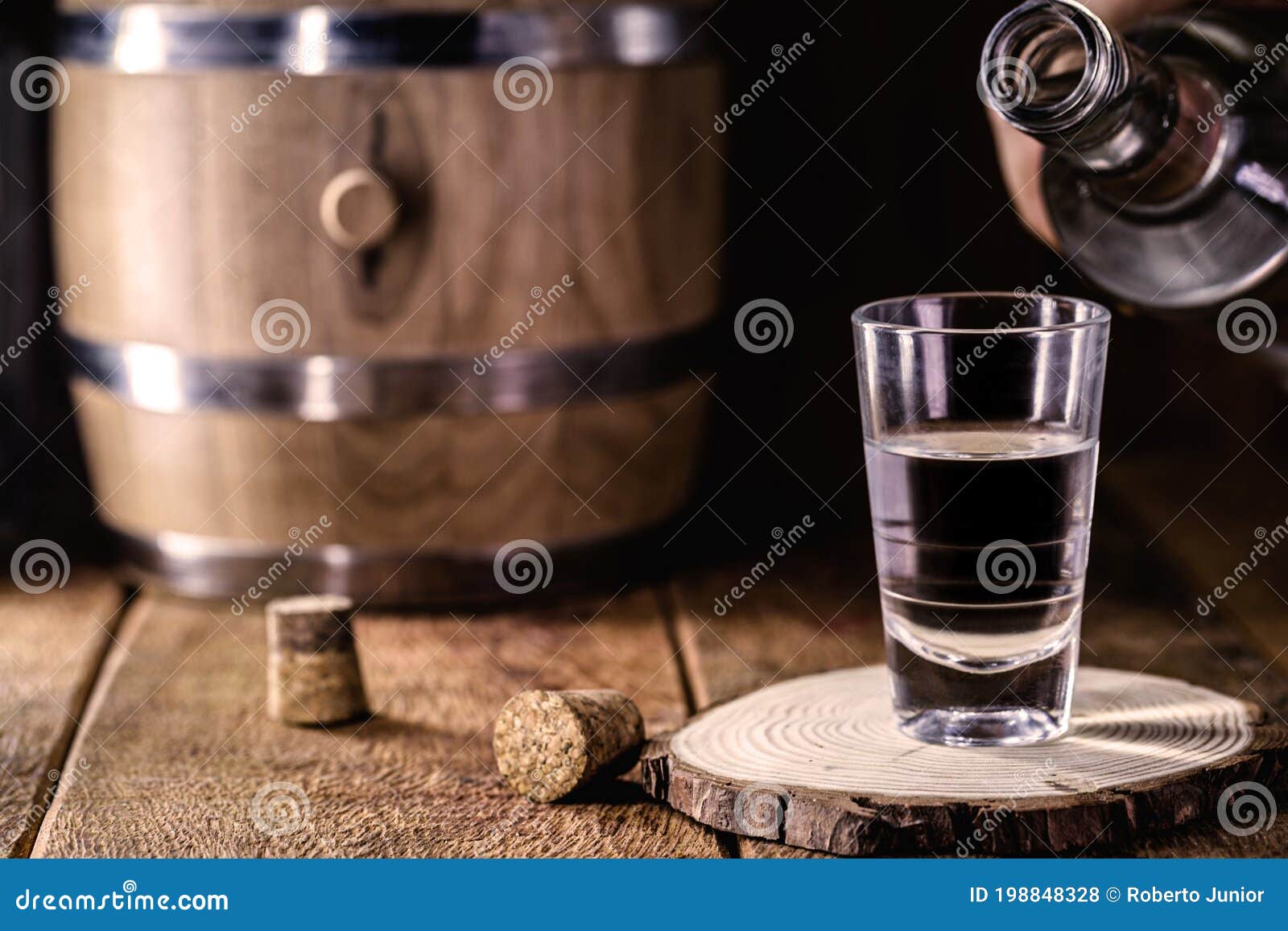 Alcoholic Drink, in a Rustic Pub Setting, Being Served in an Old Bottle ...