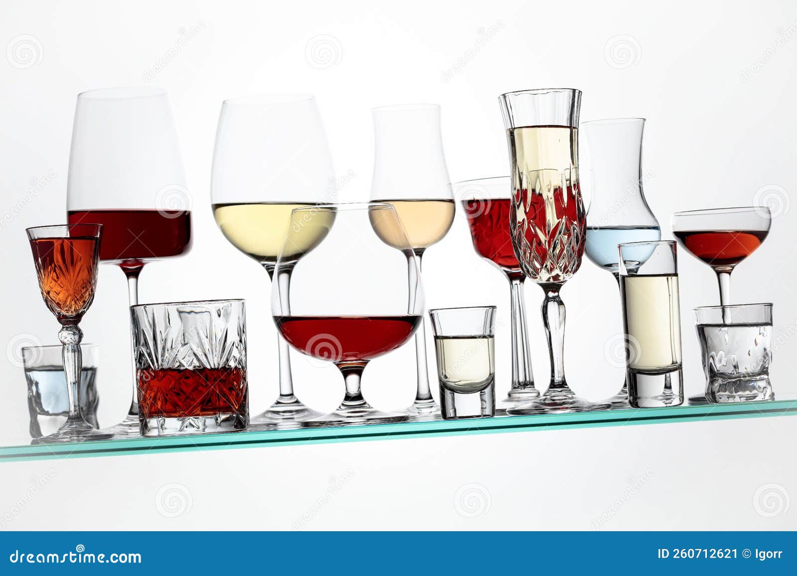 Alcoholic Drinks on a Tilted Glass Shelf Stock Image - Image of liqueur ...