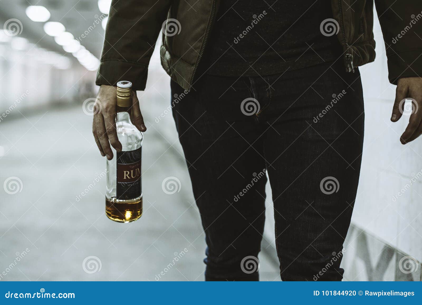 Homeless With Bottle Of Alcohol Sitting Near Waste Container Stock ...