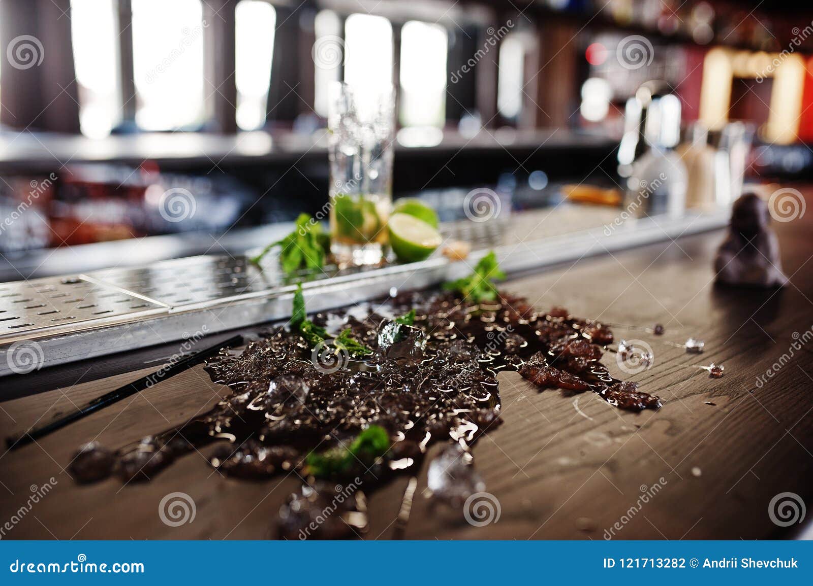 Alcoholic Spilled Coctail with Mint and Ice at Bar Table. Stock Photo ...