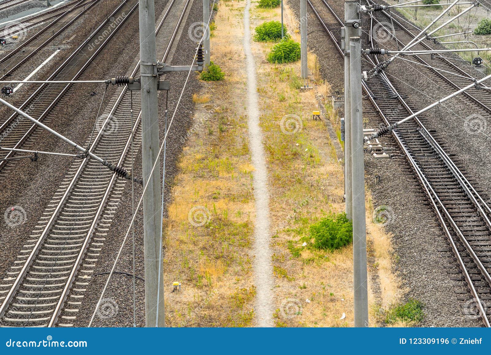 Alienated Image of a Footpath Running between Two Railway Tracks for ...